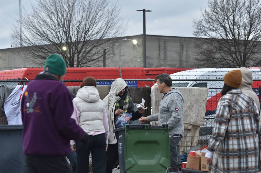 PHOTOS: Care packages bring bright smiles to rainy Kelowna tent city ...