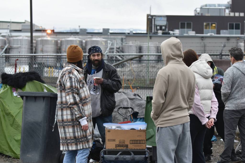 PHOTOS: Care packages bring bright smiles to rainy Kelowna tent city ...